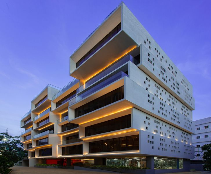 Cantilevered cuboid volumes create a sculptural office building in ...
