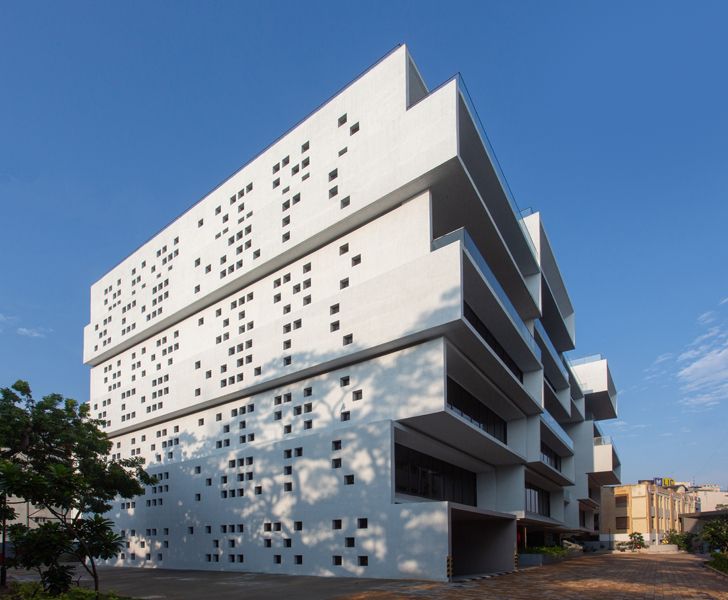 Cantilevered cuboid volumes create a sculptural office building in ...